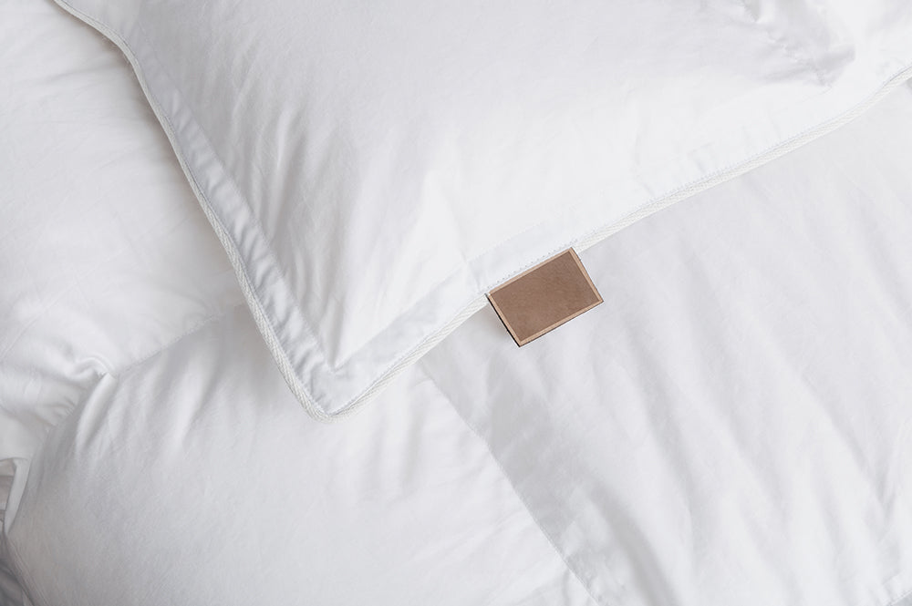 Scegliere il piumone per il letto: guida all’acquisto 2025
